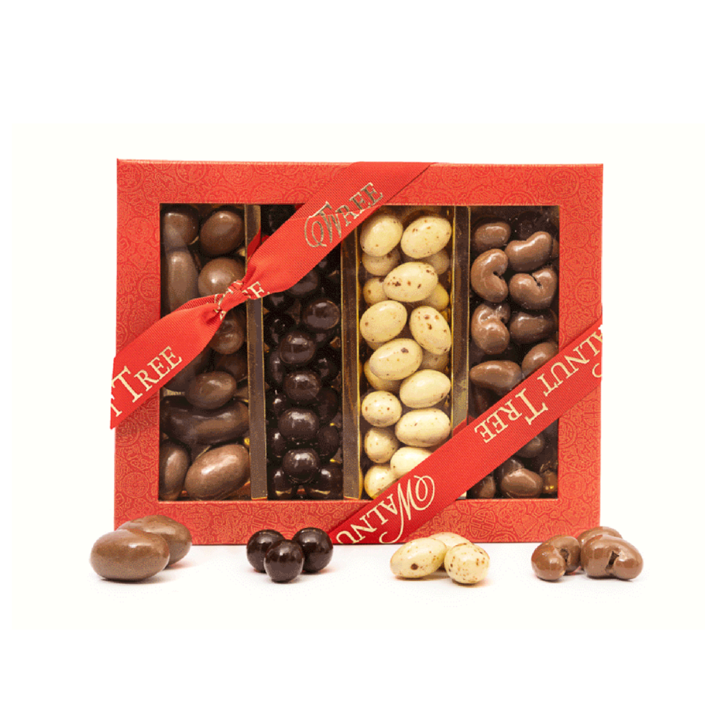 Milk, dark, white and caramel chocolate covered nuts